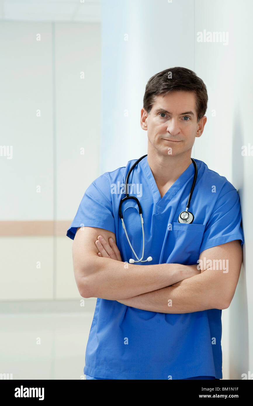 Portrait of a doctor thinking Stock Photo - Alamy