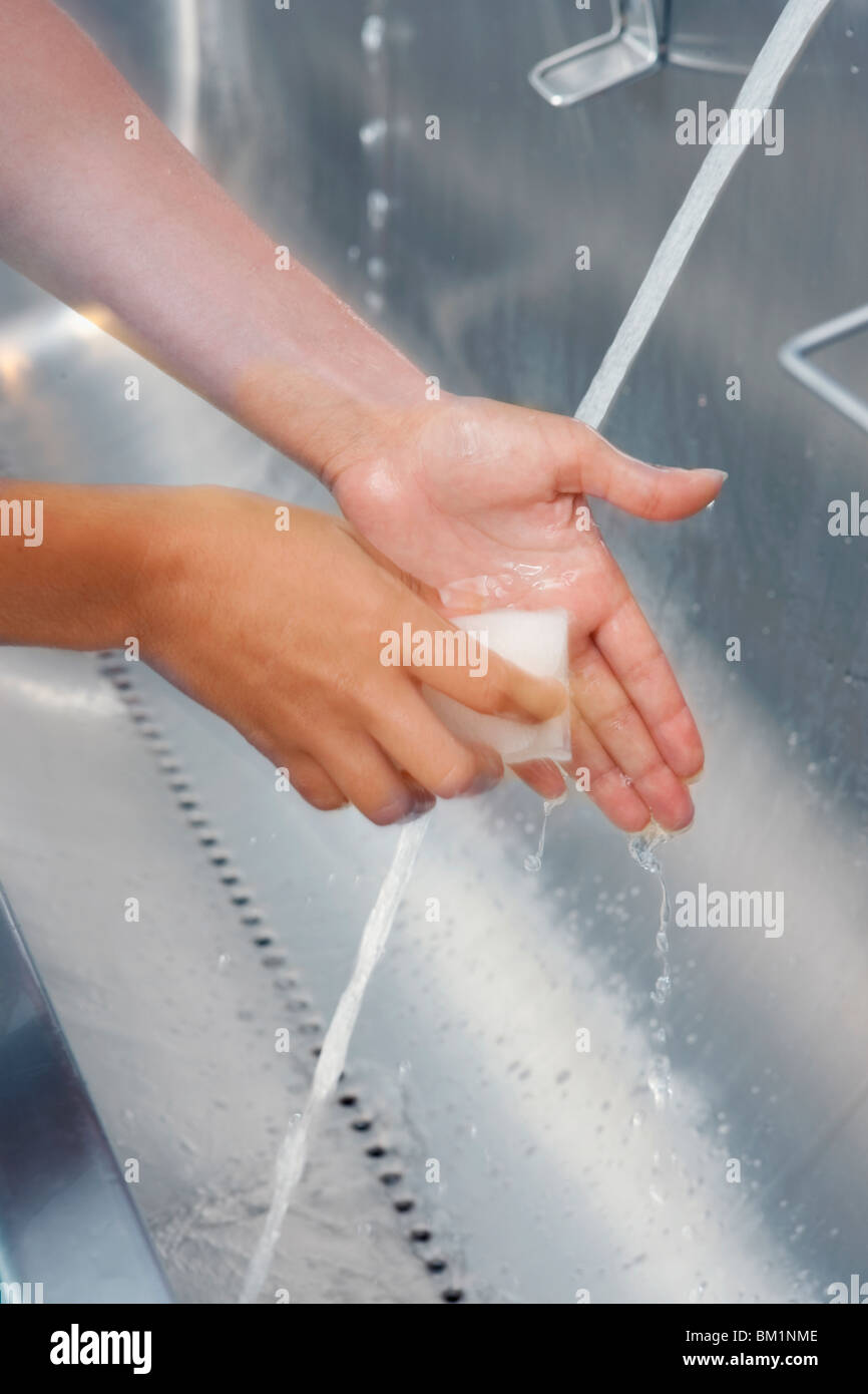 Person washing hands Stock Photo - Alamy
