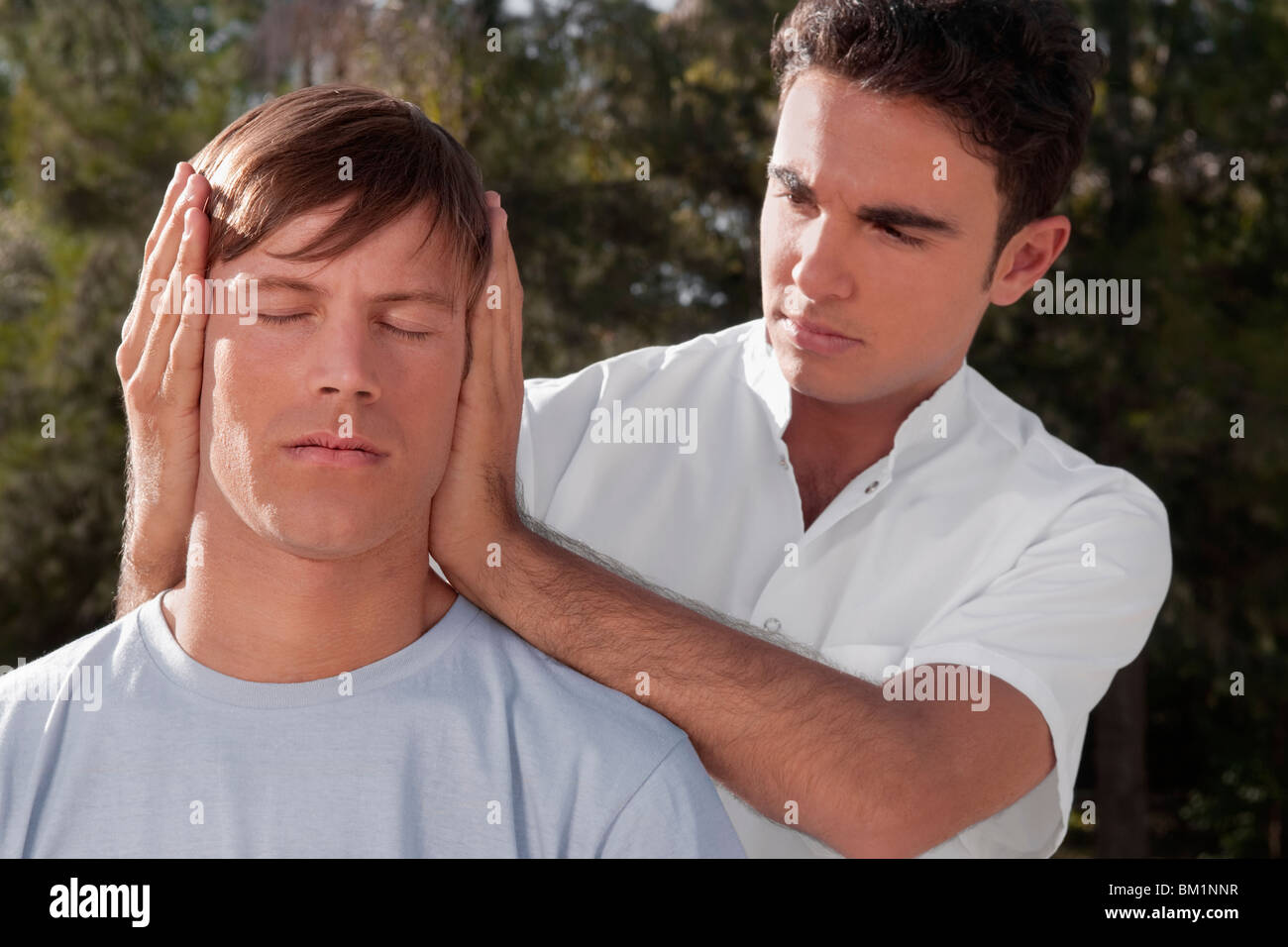 Man receiving a head massage Stock Photo - Alamy