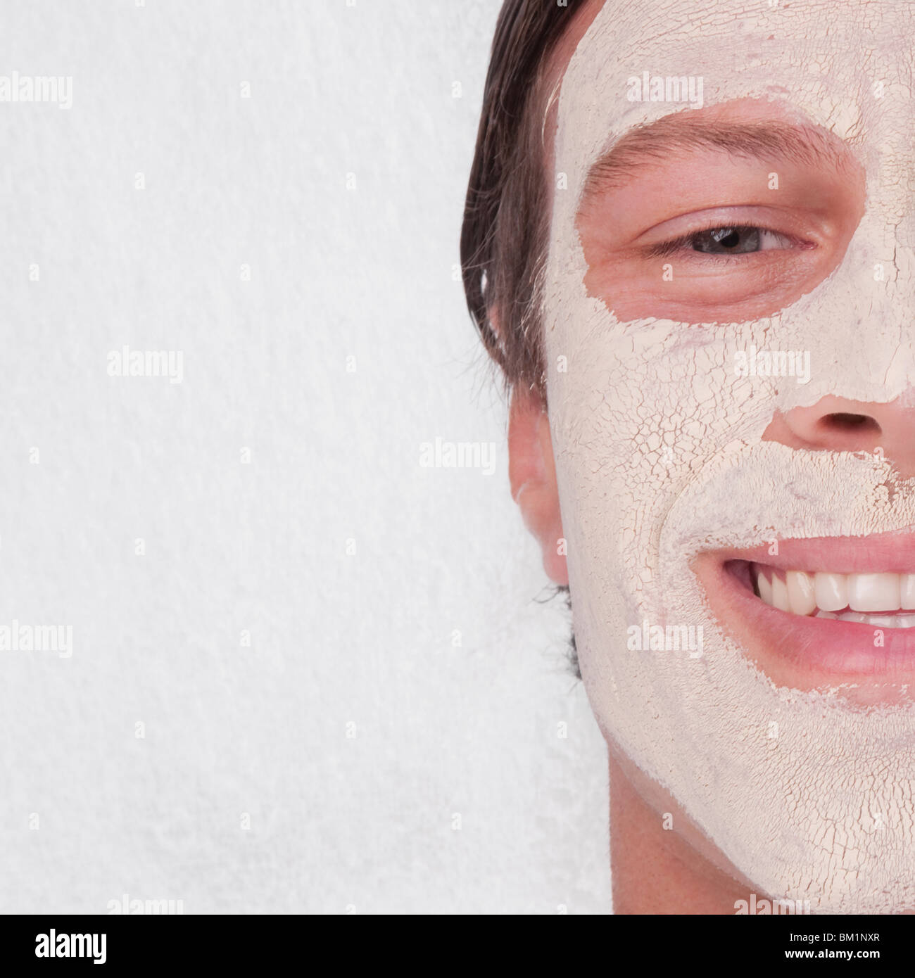 Man with face pack on his face Stock Photo - Alamy