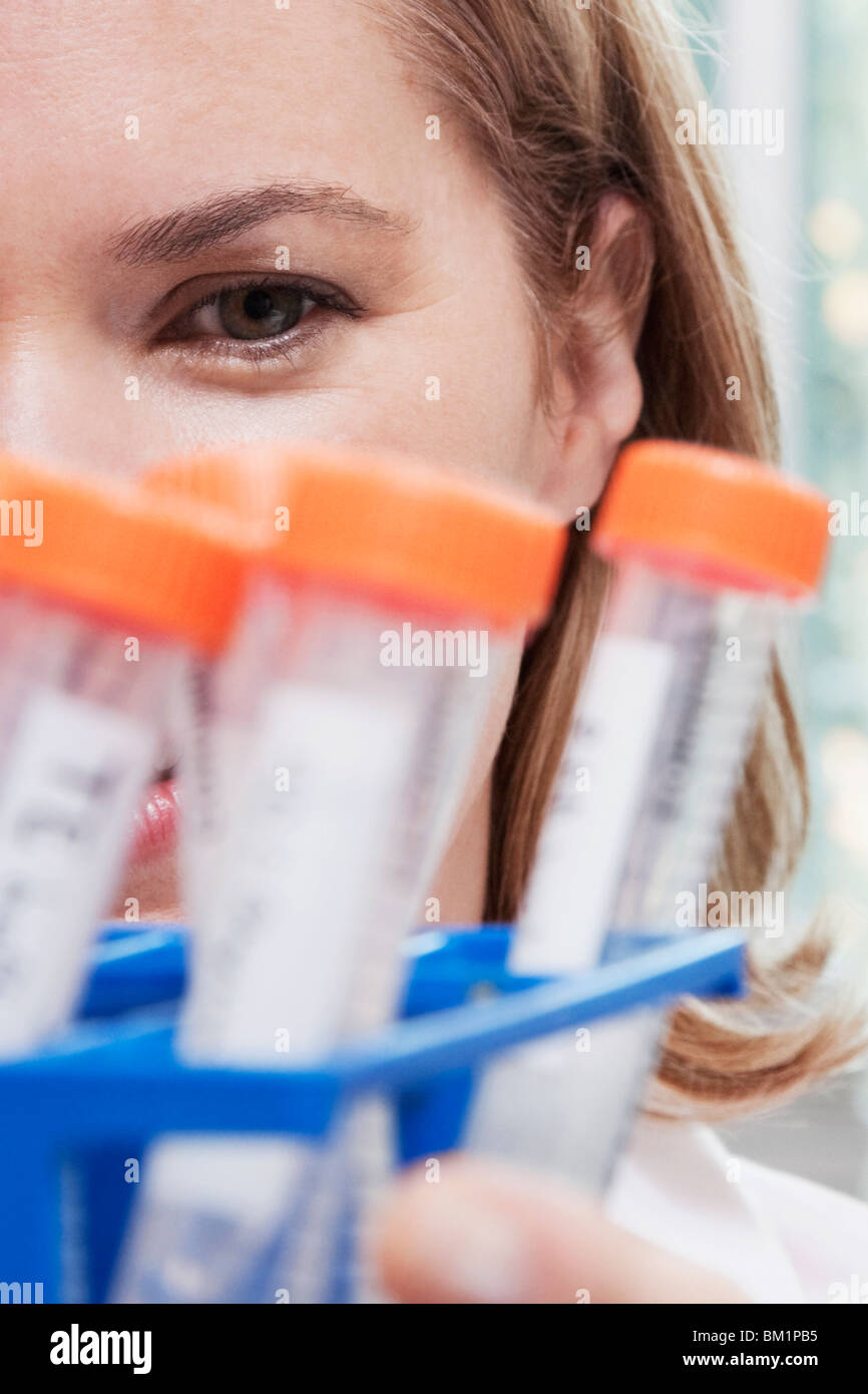 Female doctor holding medical samples in a laboratory Stock Photo - Alamy