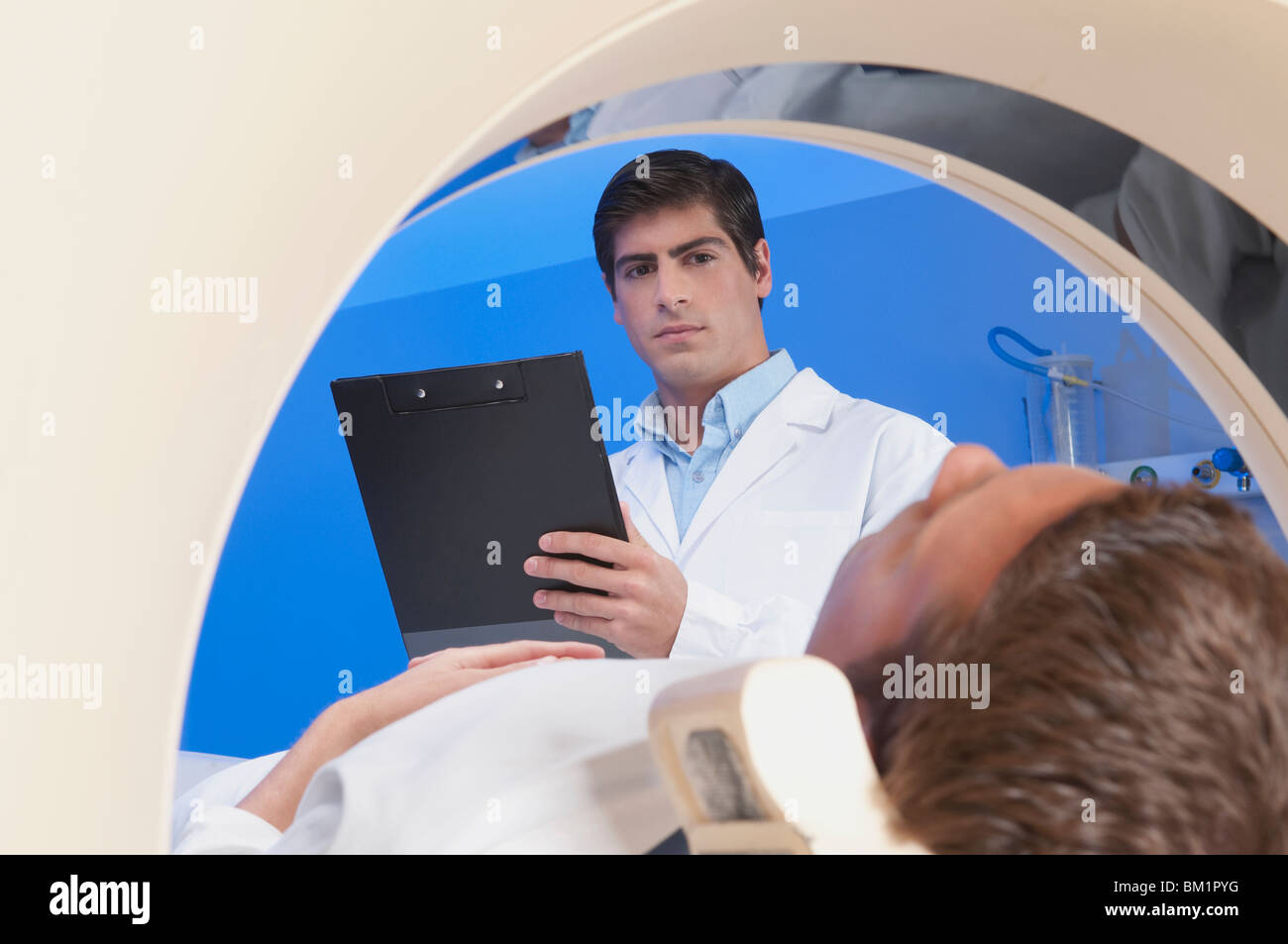 Patient going through an MRI scan Stock Photo - Alamy