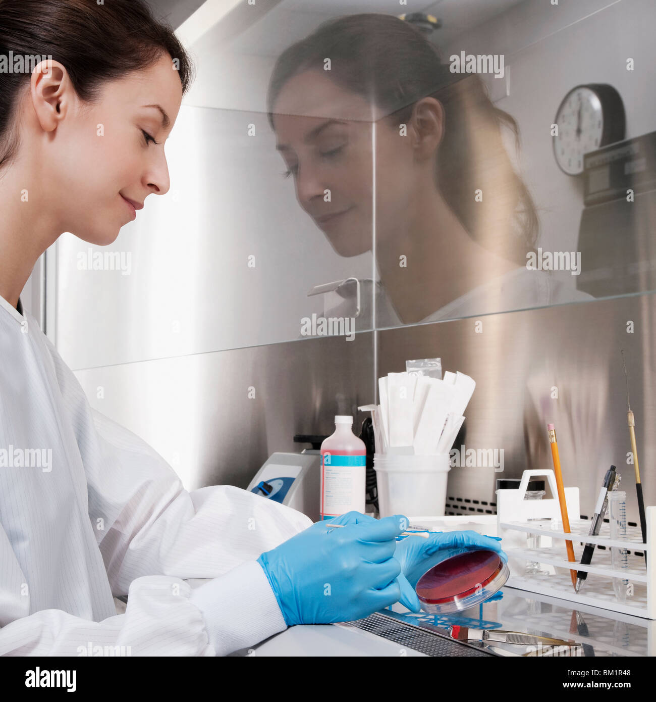 Female doctor researching in a laboratory Stock Photo - Alamy