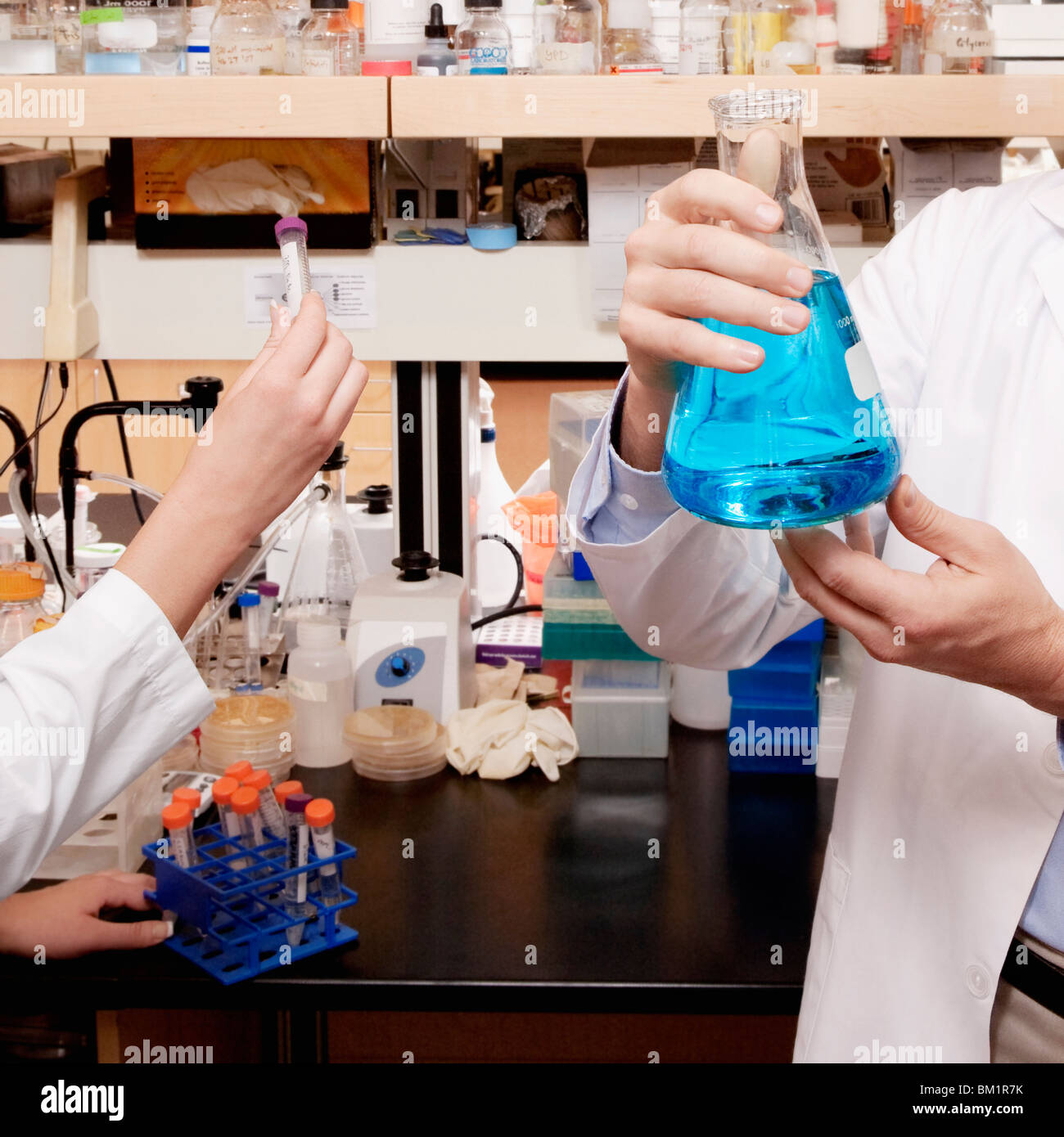 Doctors researching in a laboratory Stock Photo - Alamy