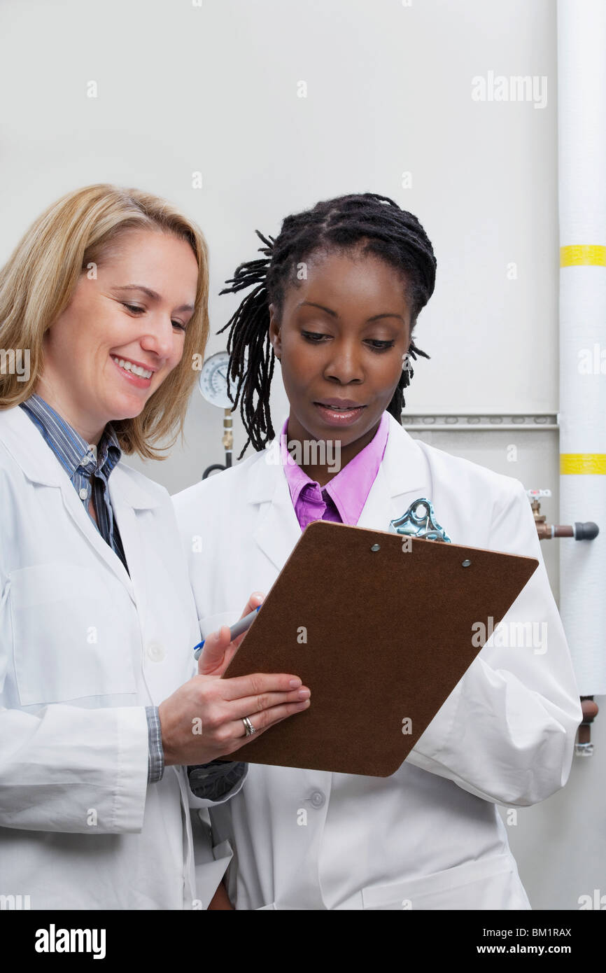 Female doctors working in a laboratory Stock Photo - Alamy