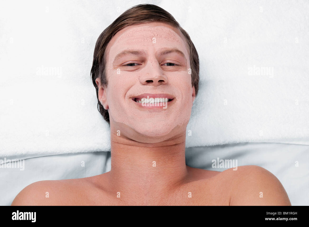 Man with face pack on his face Stock Photo - Alamy