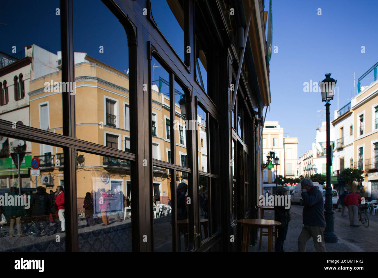 Reflections on a bar window, Seville, Spain Stock Photo - Alamy