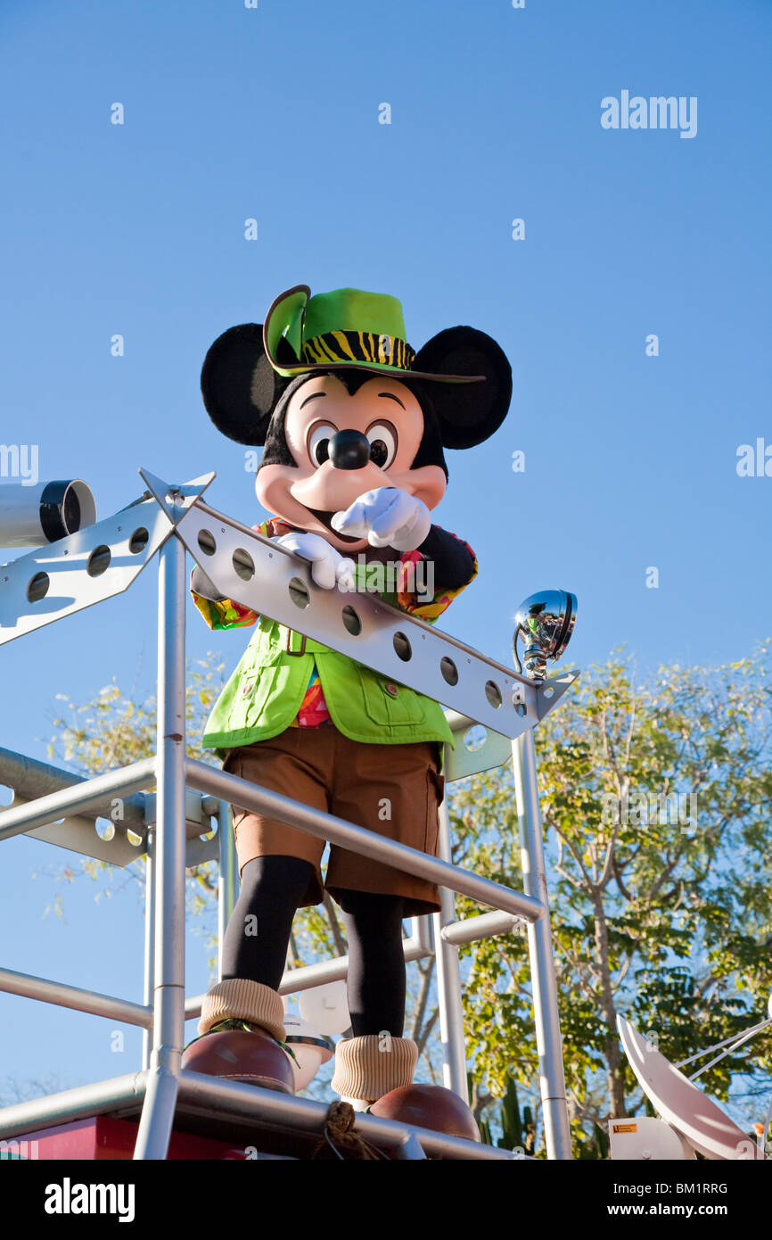 Mickey Mouse character rides float in Jammin' Jungle Parade at Disney's ...