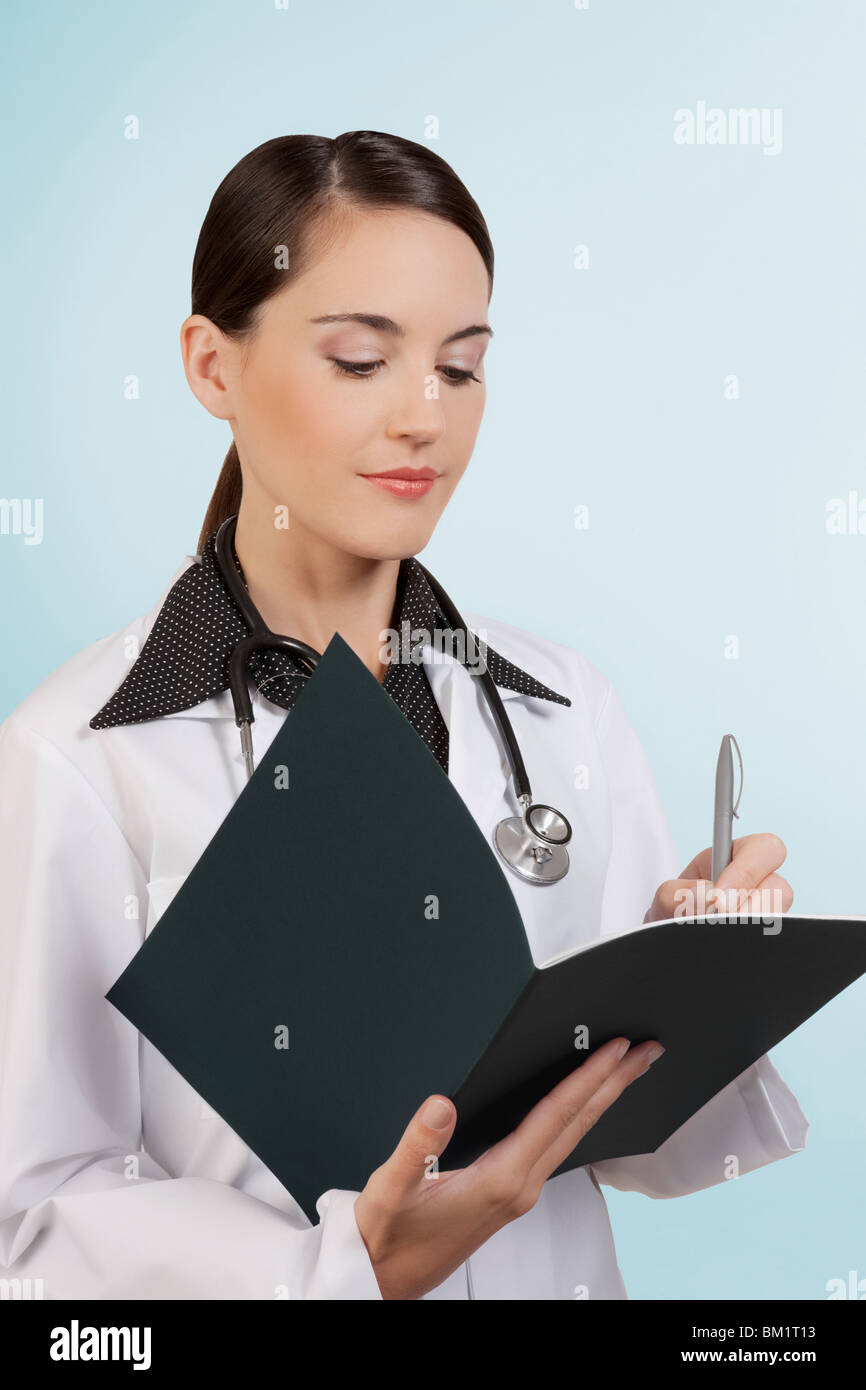 Vertical shot female doctor hi-res stock photography and images - Alamy