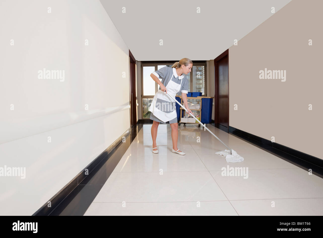 Janitor cleaning the corridor of a hospital Stock Photo - Alamy
