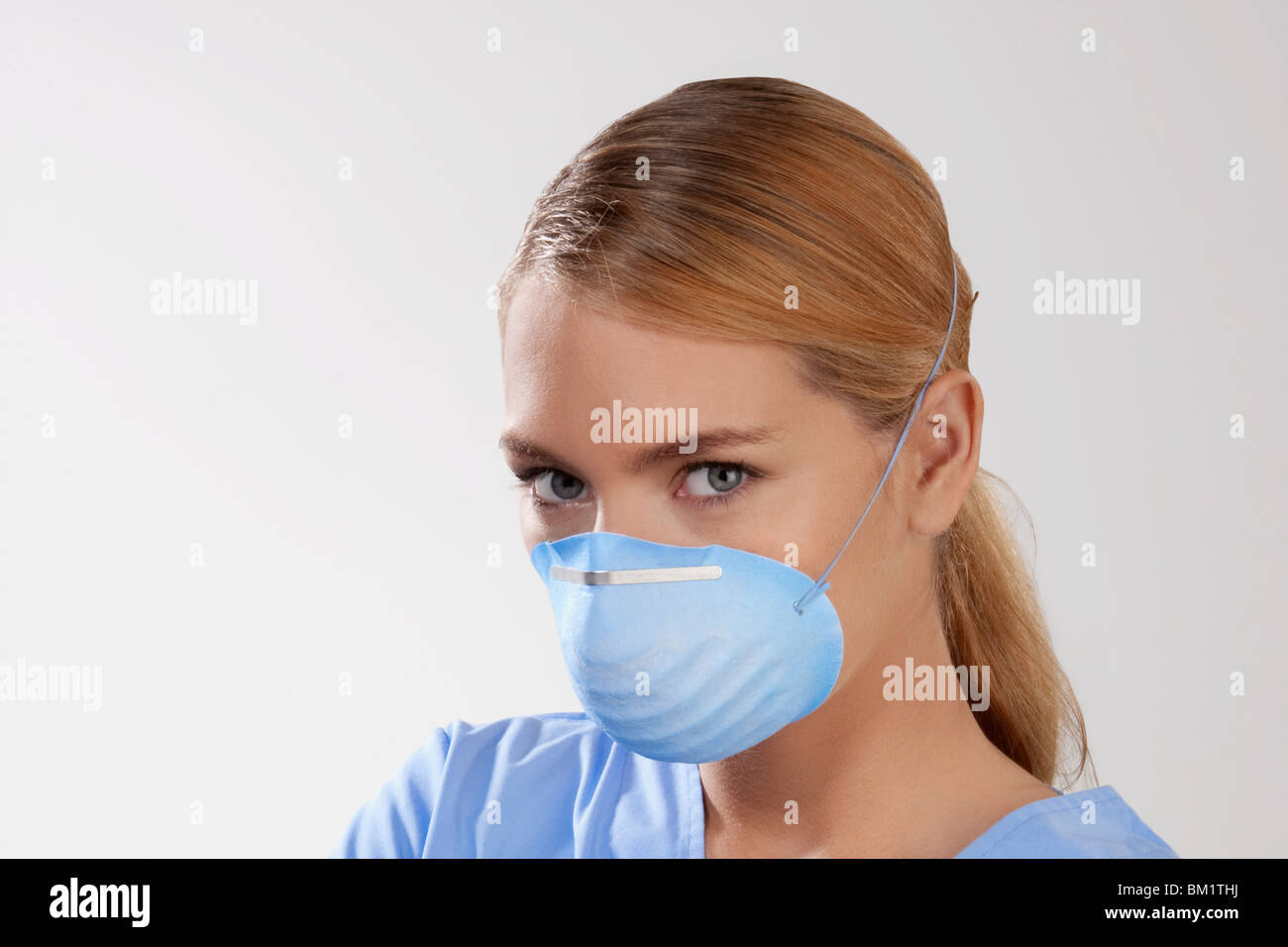 Young doctor wearing protection hi-res stock photography and images - Alamy