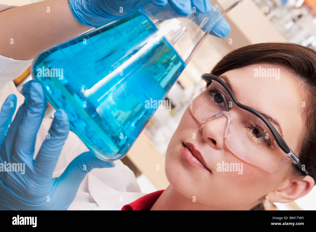 Blue conical flask hi-res stock photography and images - Alamy