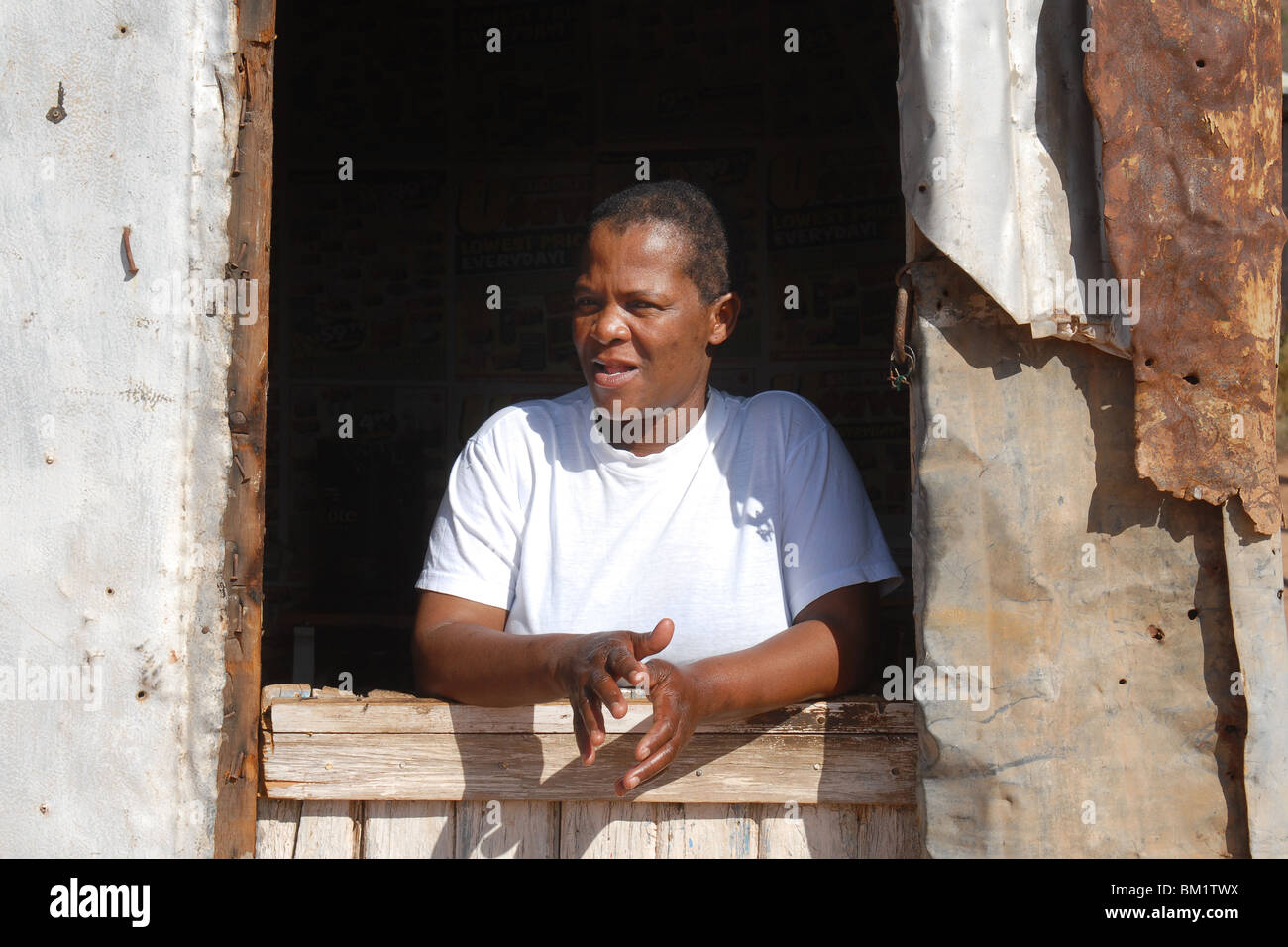 Woman in her shack Stock Photo - Alamy
