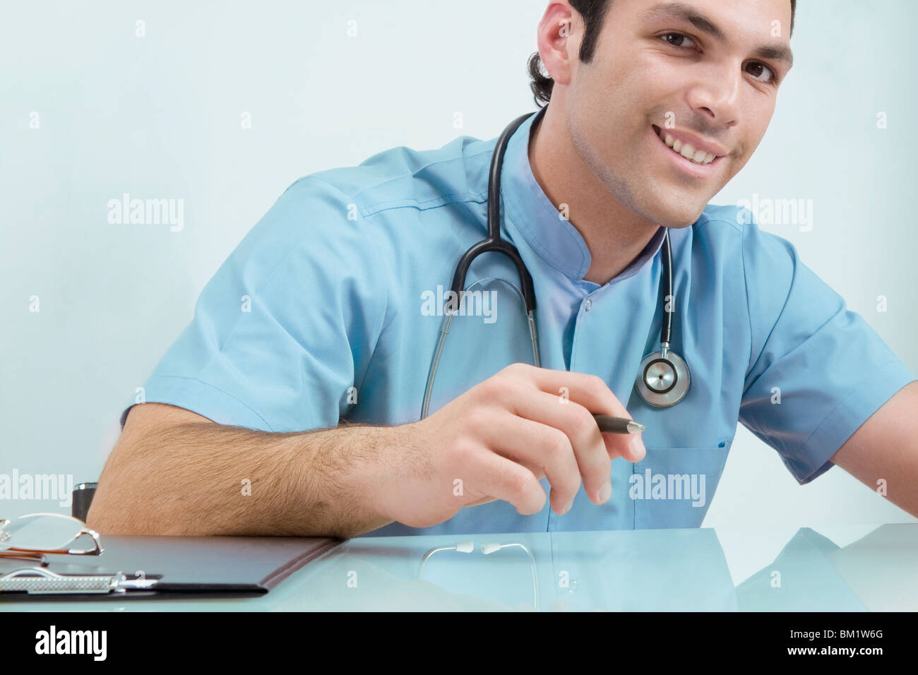 Portrait of a doctor smiling Stock Photo - Alamy