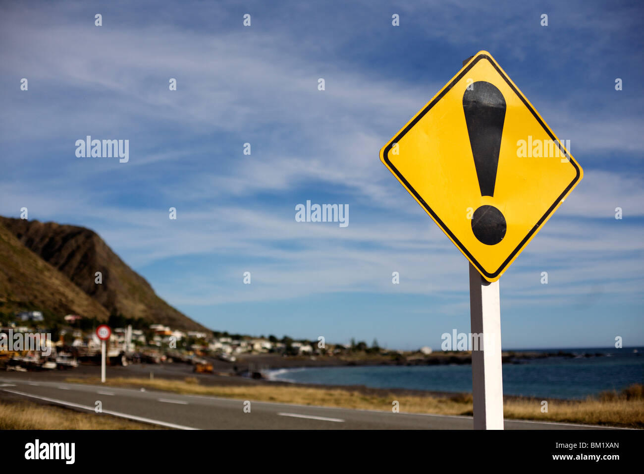 A warning road sign in New Zealand Stock Photo - Alamy