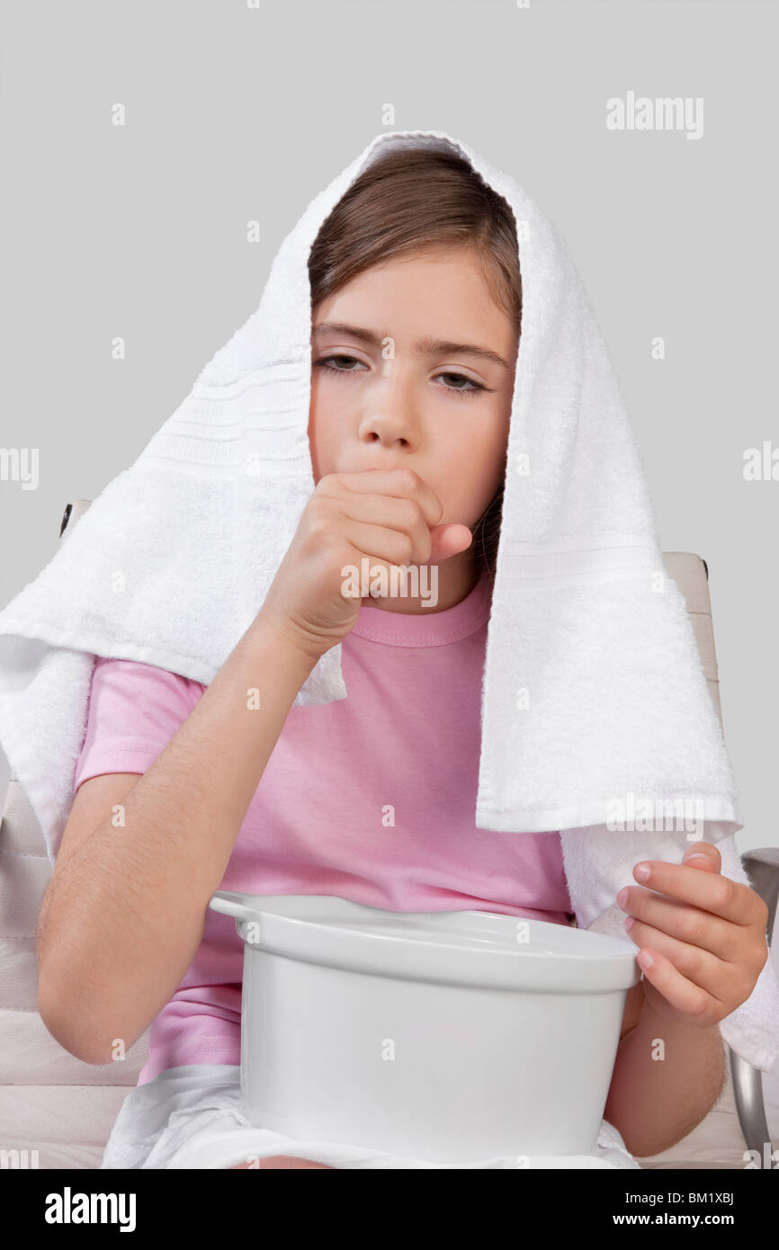 Portrait of a girl coughing Stock Photo - Alamy
