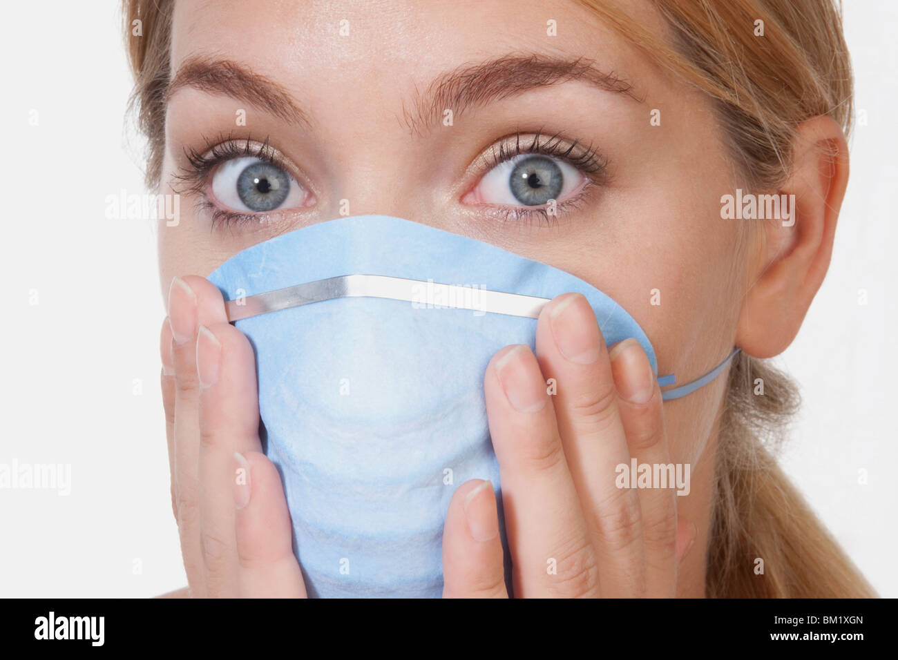 Woman wearing facial mask protection hi-res stock photography and ...