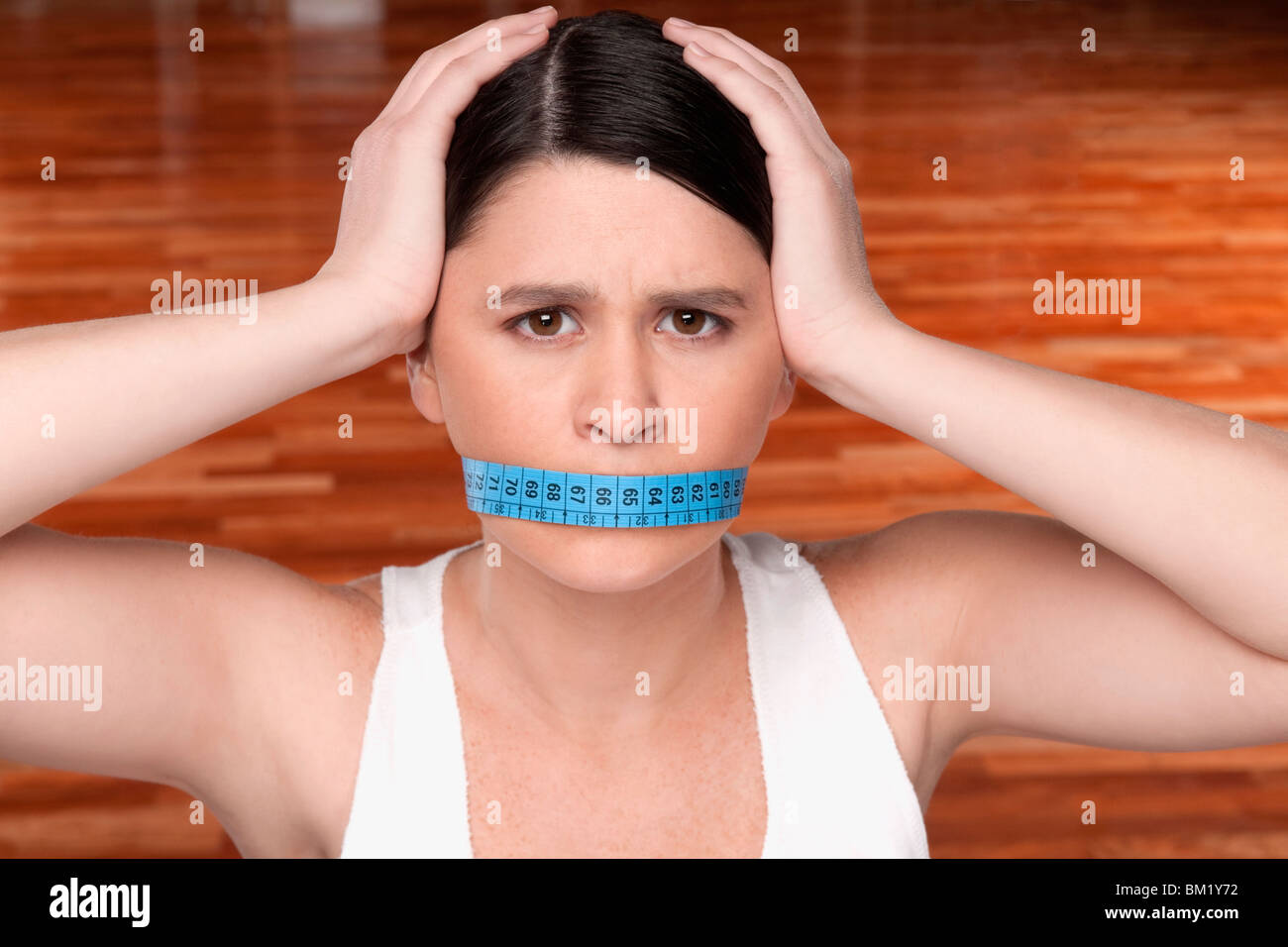 Woman tape measure mouth hi-res stock photography and images - Alamy