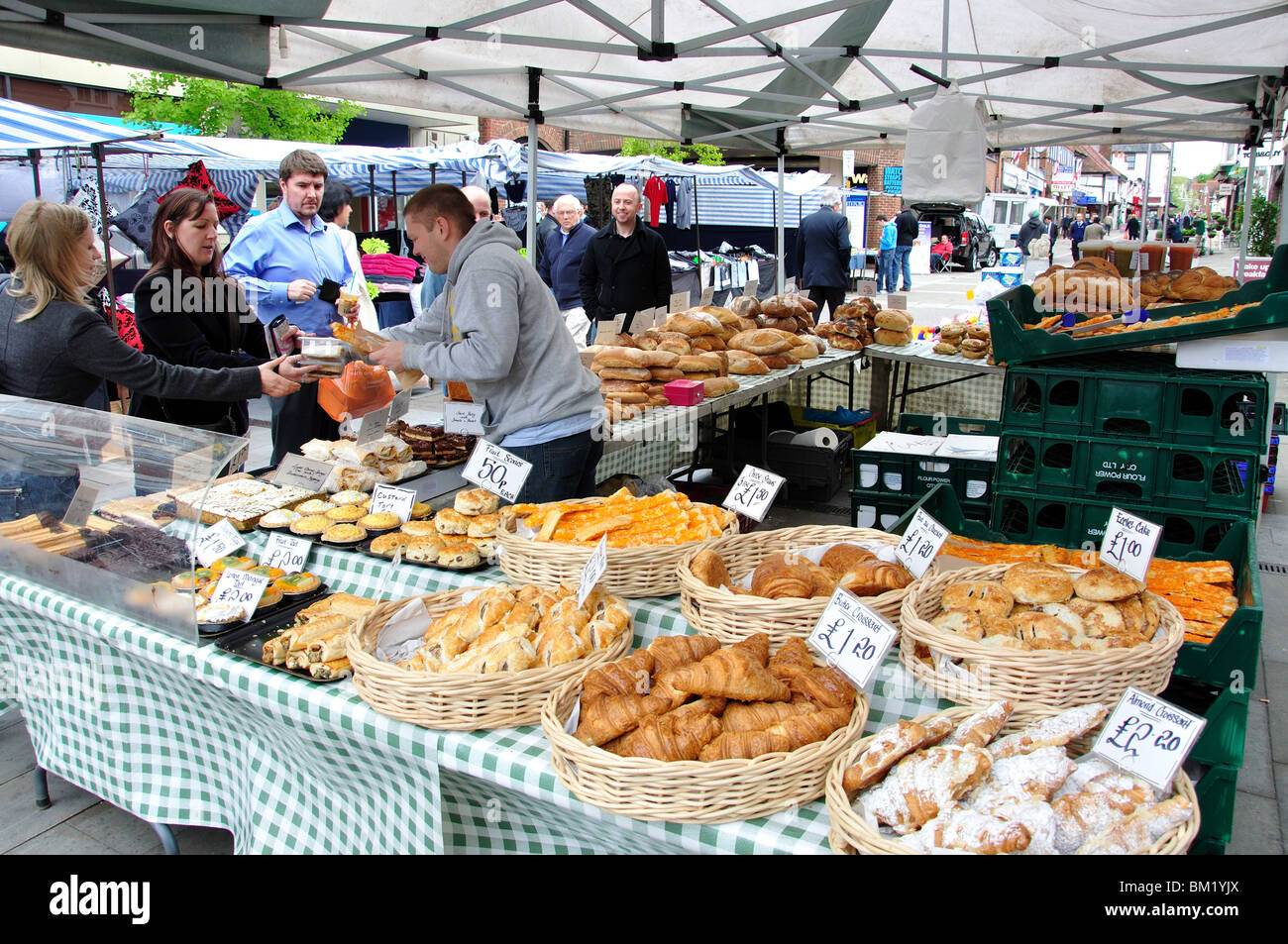 Bakery stall at weekly street market, High Street, Leatherhead, Surrey ...