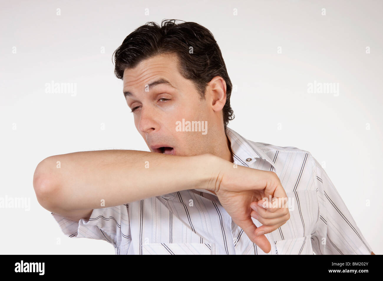 Sneezing into arm hi-res stock photography and images - Alamy
