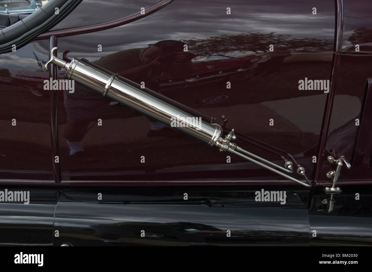 Hand Pump to move gasoline from storage tank to engine on old car Stock ...