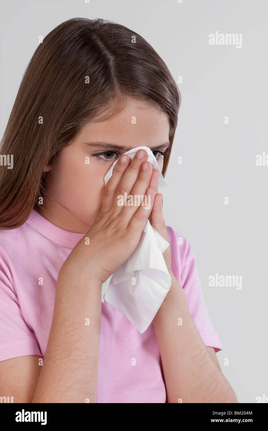 Girl suffering from cold Stock Photo - Alamy