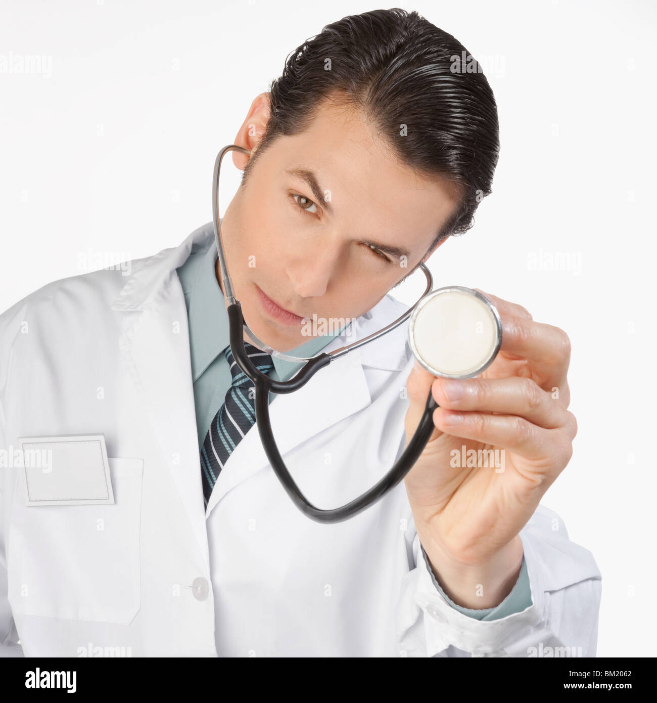 Portrait of a doctor holding a stethoscope Stock Photo - Alamy