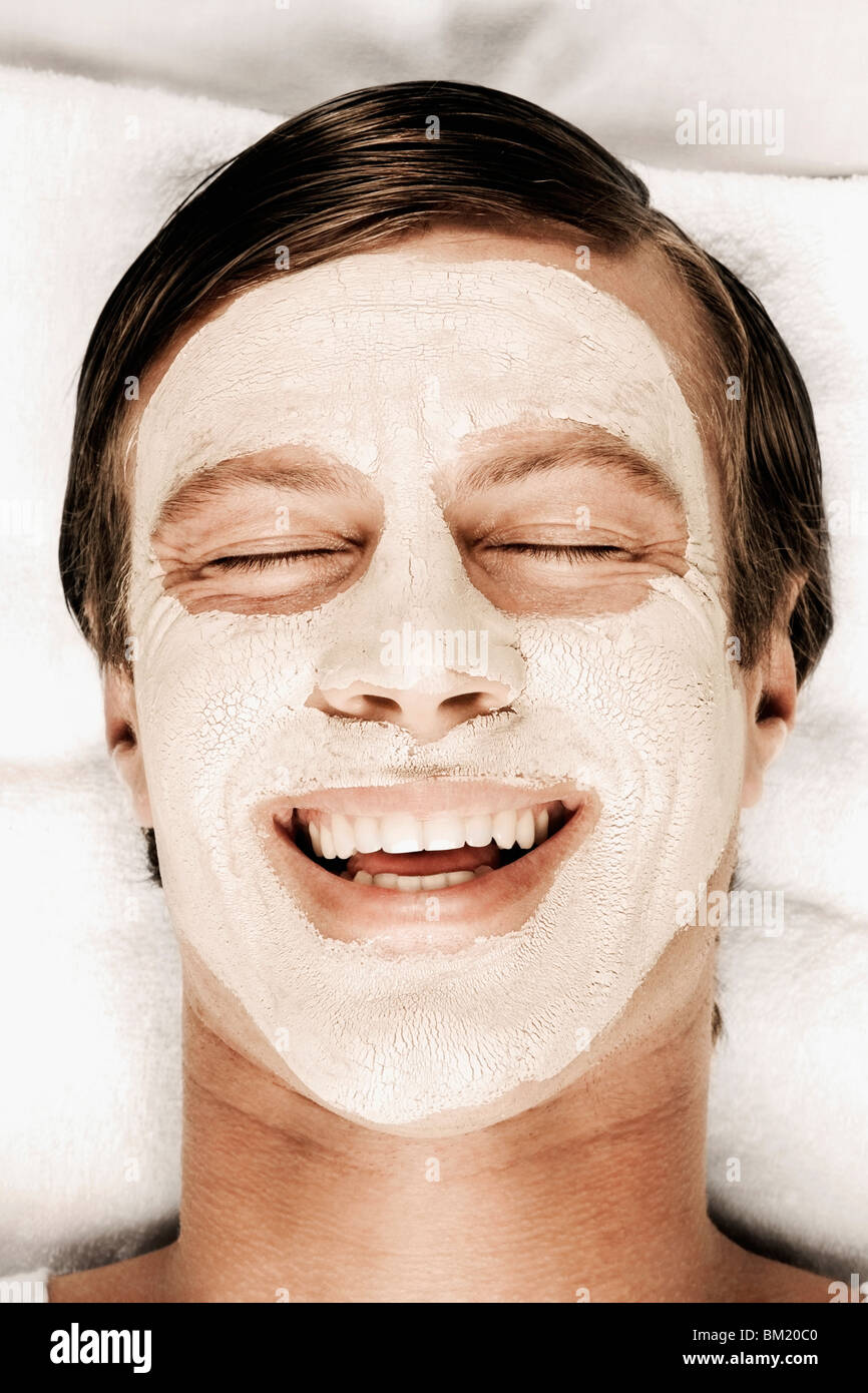 Man with face pack on his face Stock Photo - Alamy