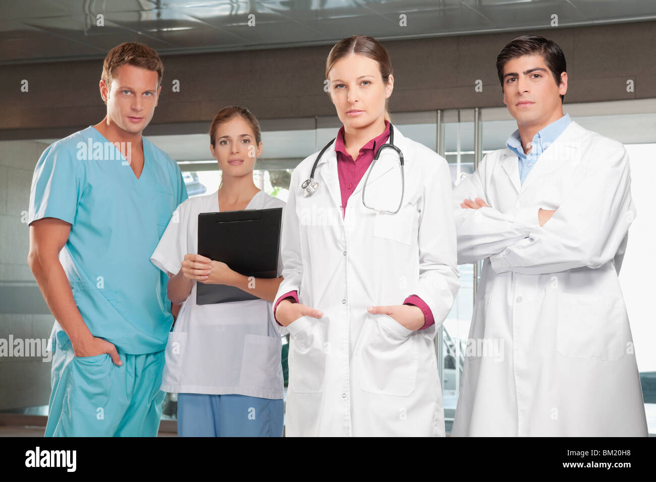 Doctors standing together Stock Photo - Alamy