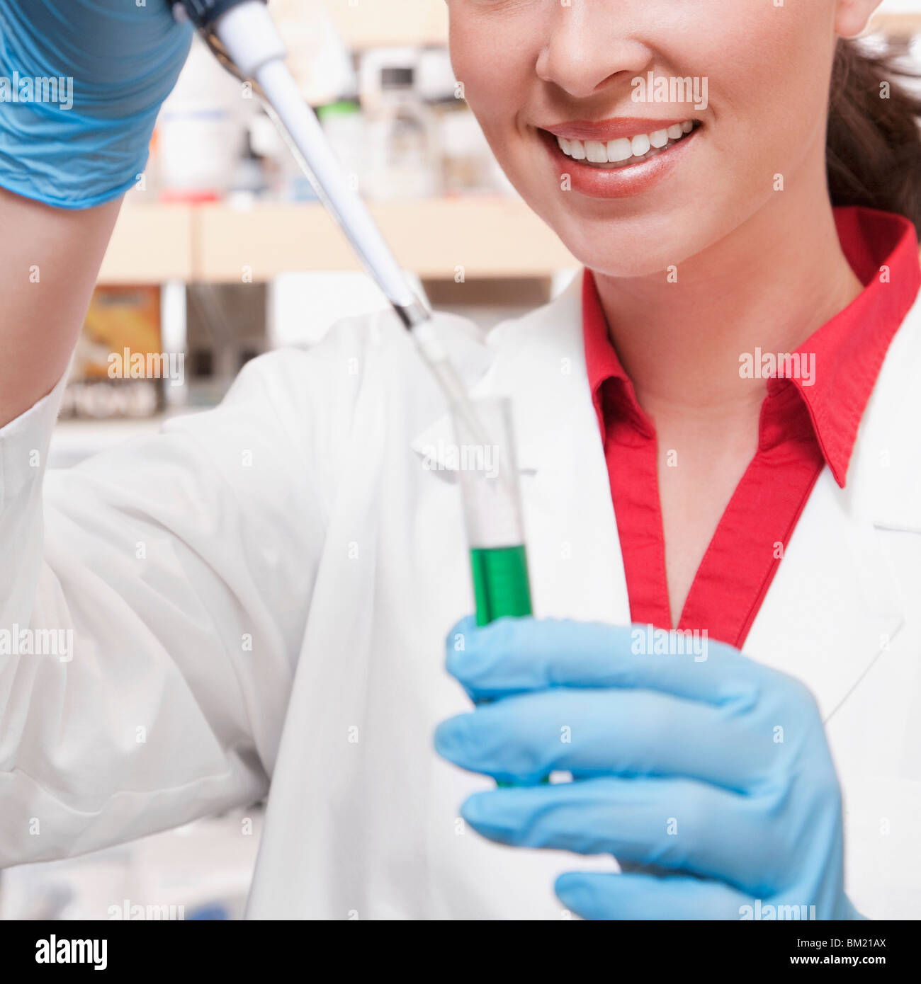 Female doctor researching in a laboratory Stock Photo - Alamy