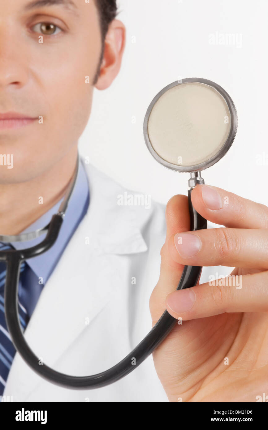 Portrait of a doctor holding a stethoscope Stock Photo - Alamy