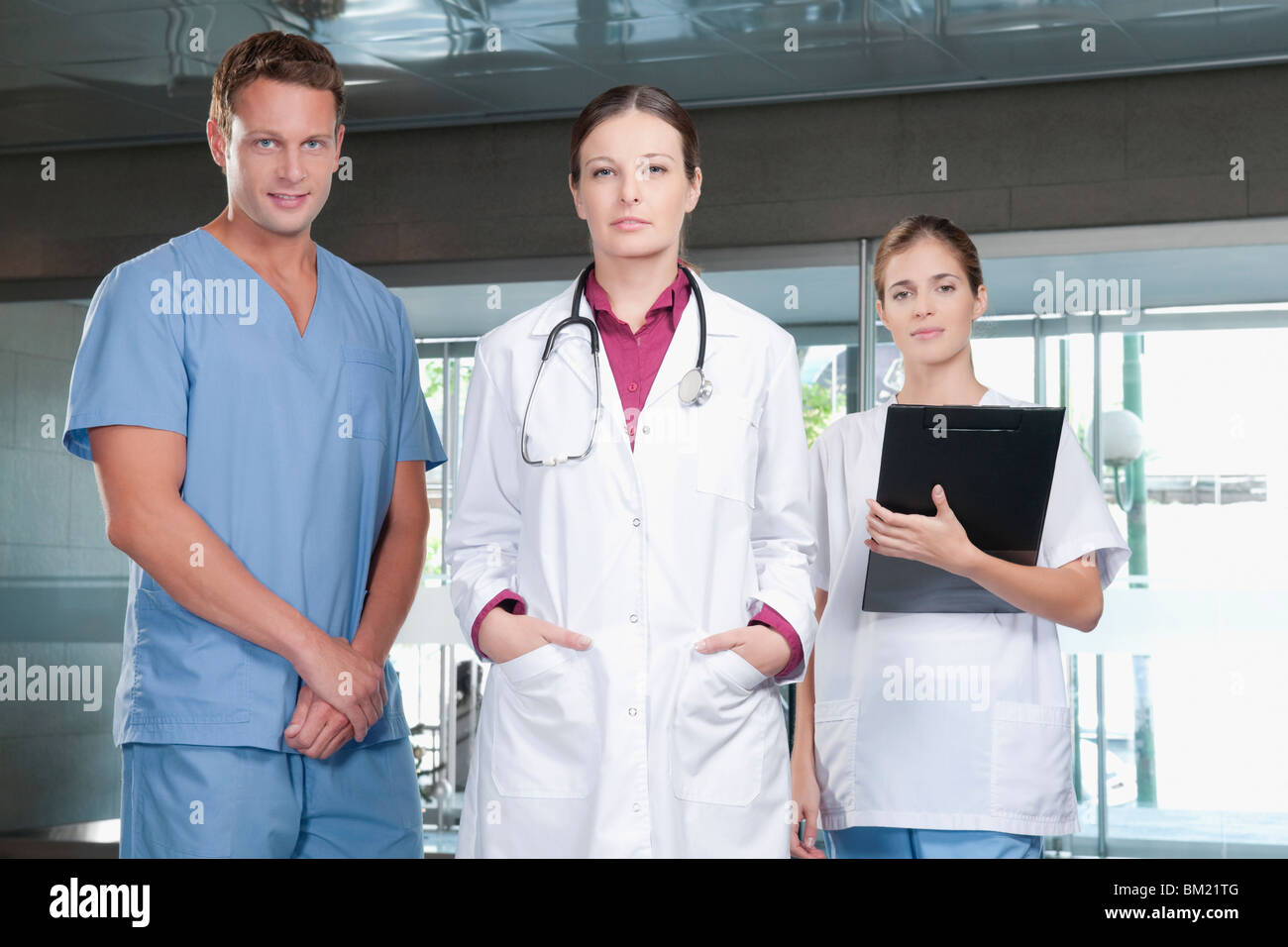 Doctors standing together Stock Photo - Alamy
