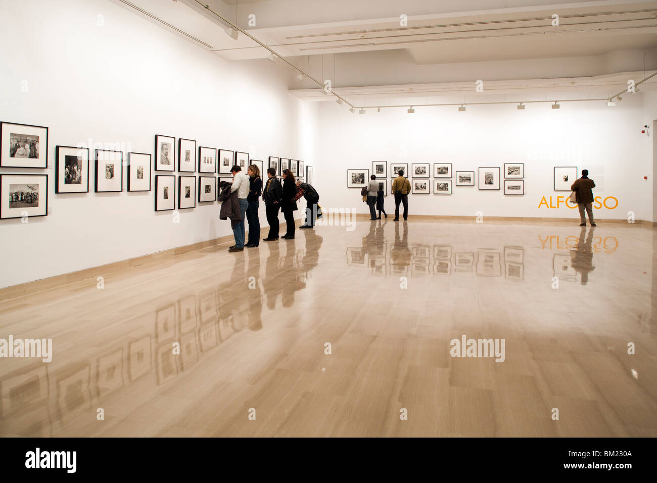 People in a photo exhibition, Seville, Spain Stock Photo - Alamy