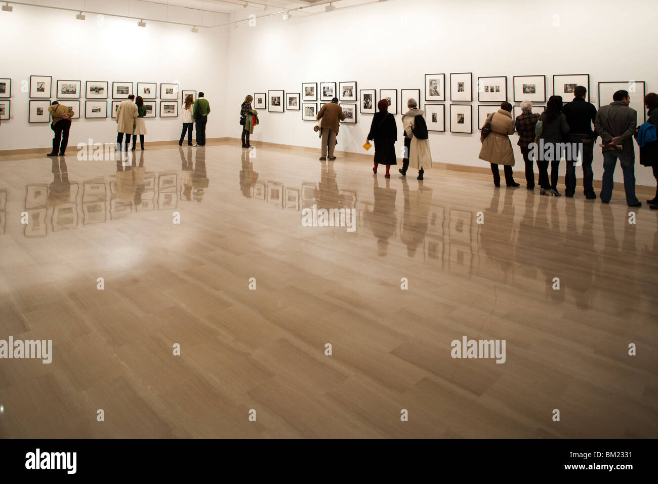 People in a photo exhibition, Seville, Spain Stock Photo - Alamy