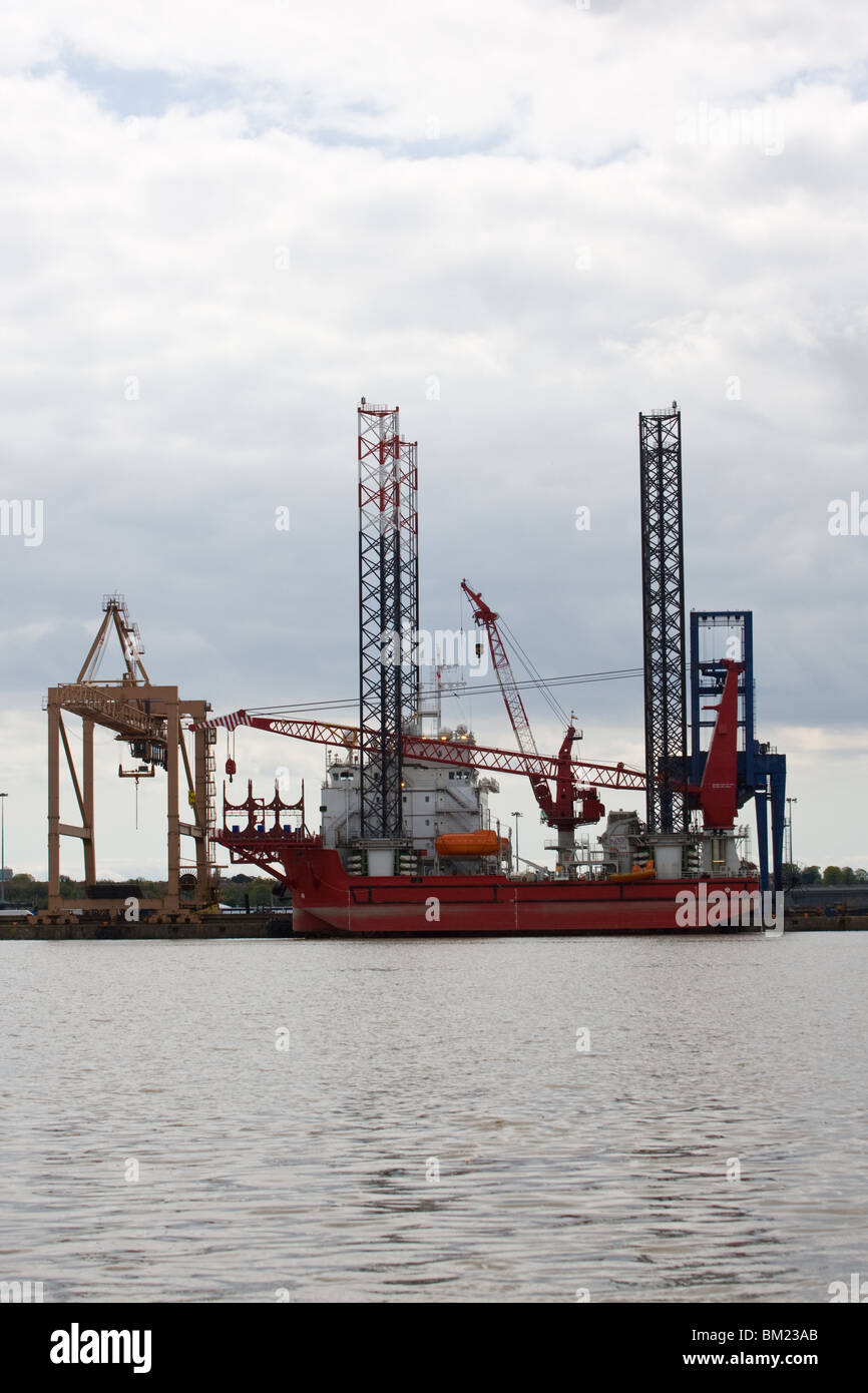 Wind farm construction barge in harbour Stock Photo - Alamy