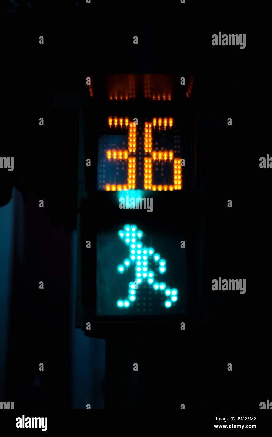 Pedestrian sign on a traffic light, Seville, Spain Stock Photo - Alamy