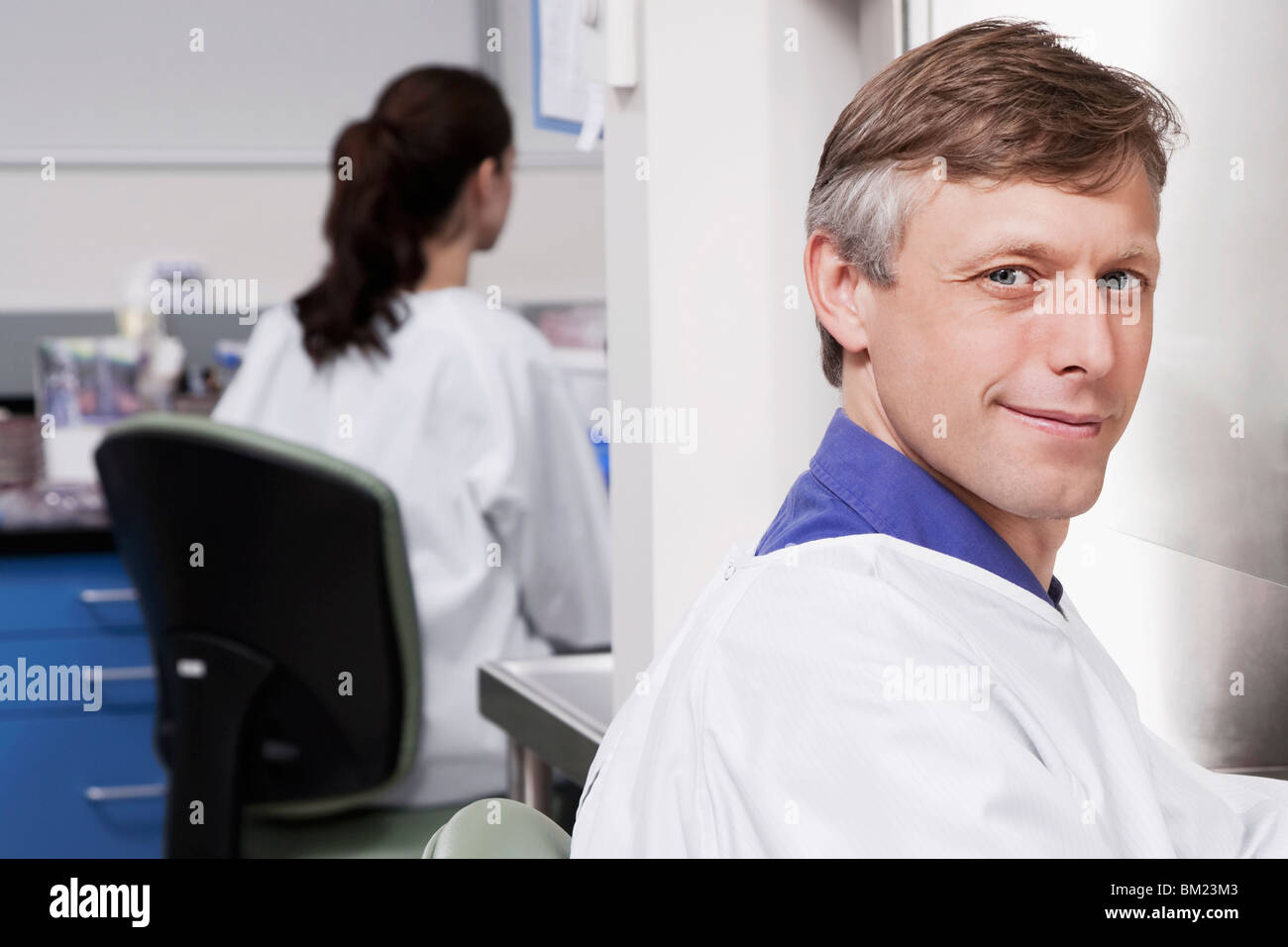 Doctors researching in a laboratory Stock Photo - Alamy