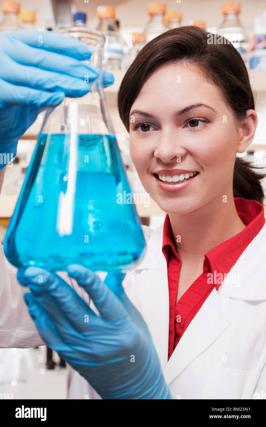 Close up of looking at liquid in conical flask hi-res stock photography ...