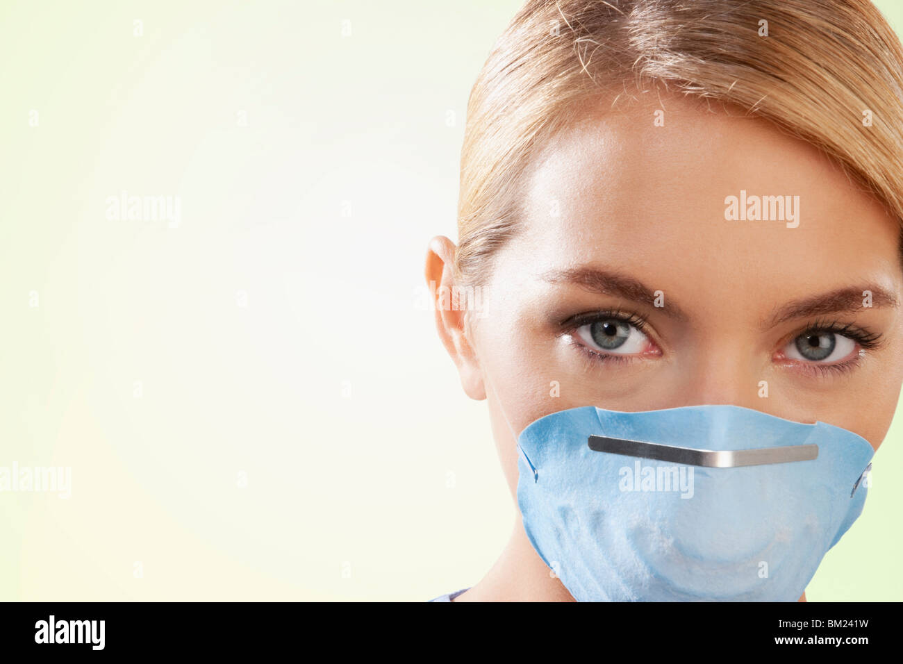 Female nurse wearing a flu mask Stock Photo - Alamy