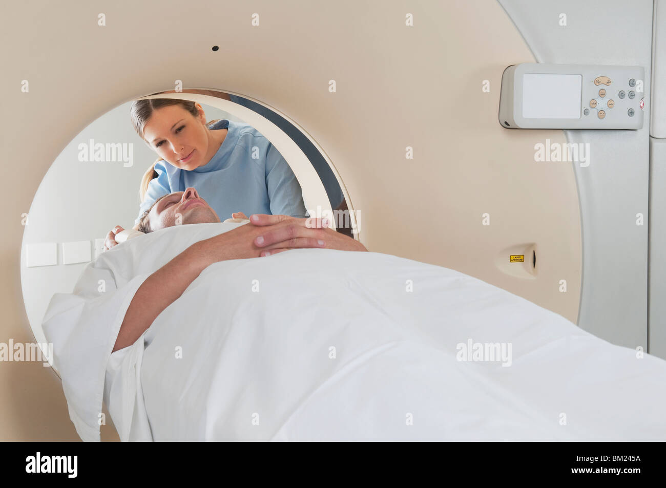 Patient going through an MRI scan Stock Photo - Alamy