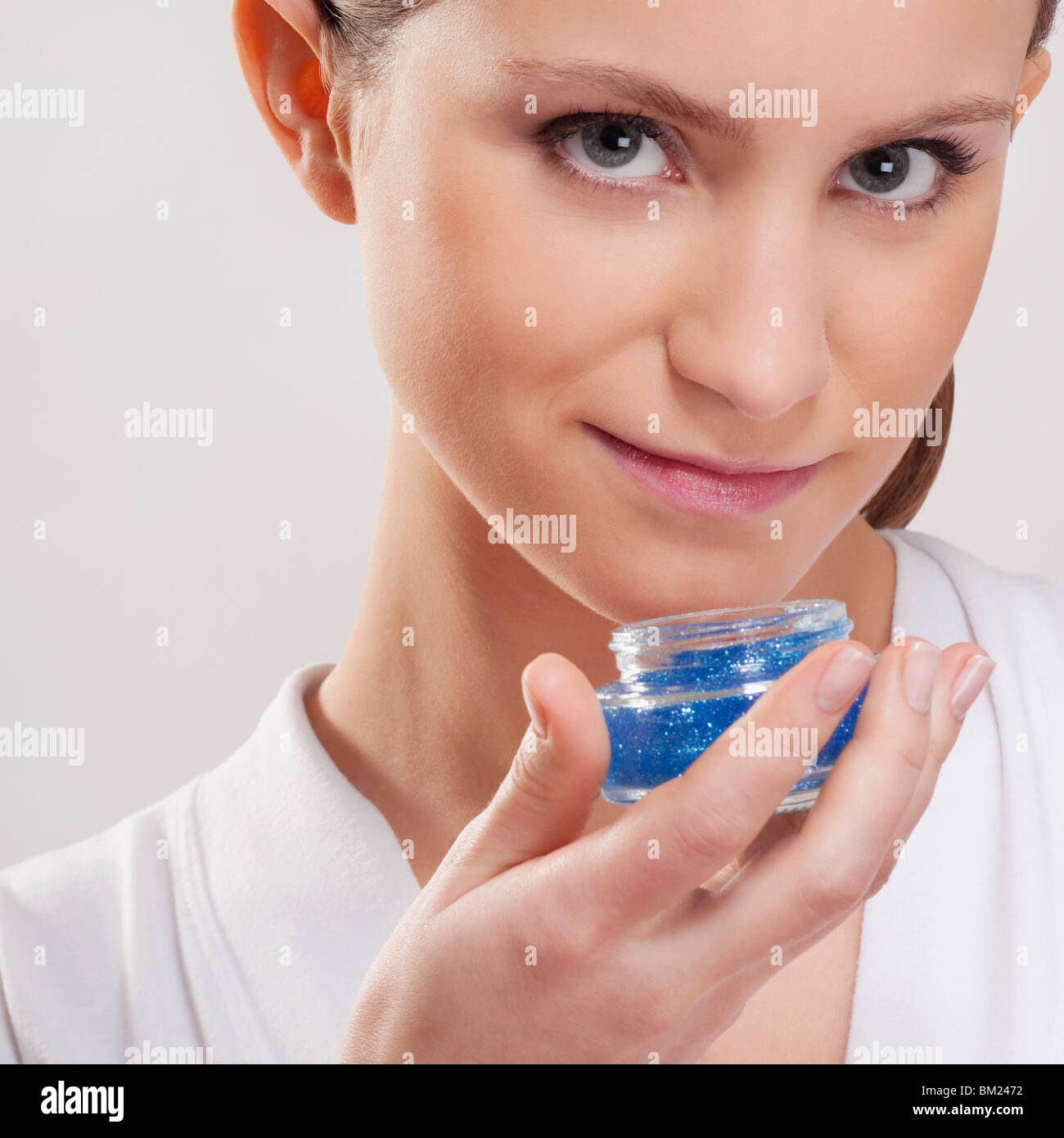 Portrait of a woman smelling aroma gel Stock Photo - Alamy