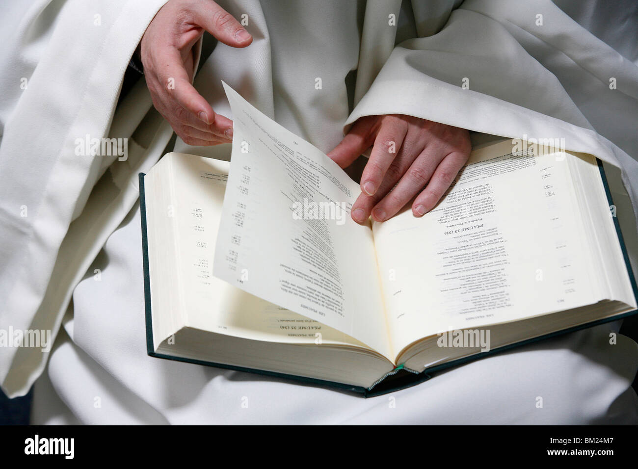 Monk reading the Bible, Evian, Haute Savoie, France, Europe Stock Photo ...