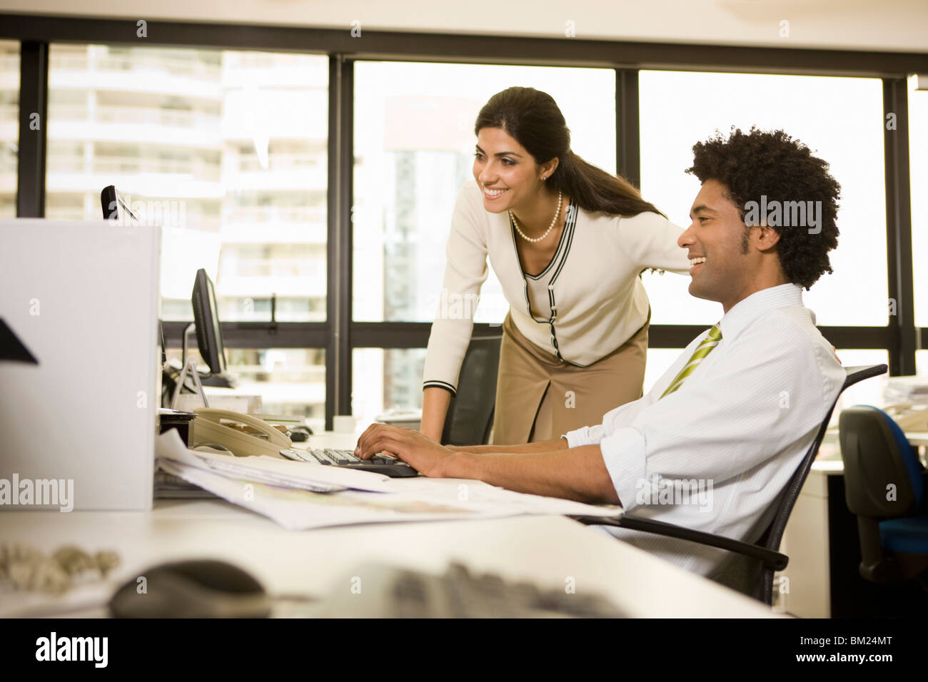 Business executives working in an office Stock Photo - Alamy