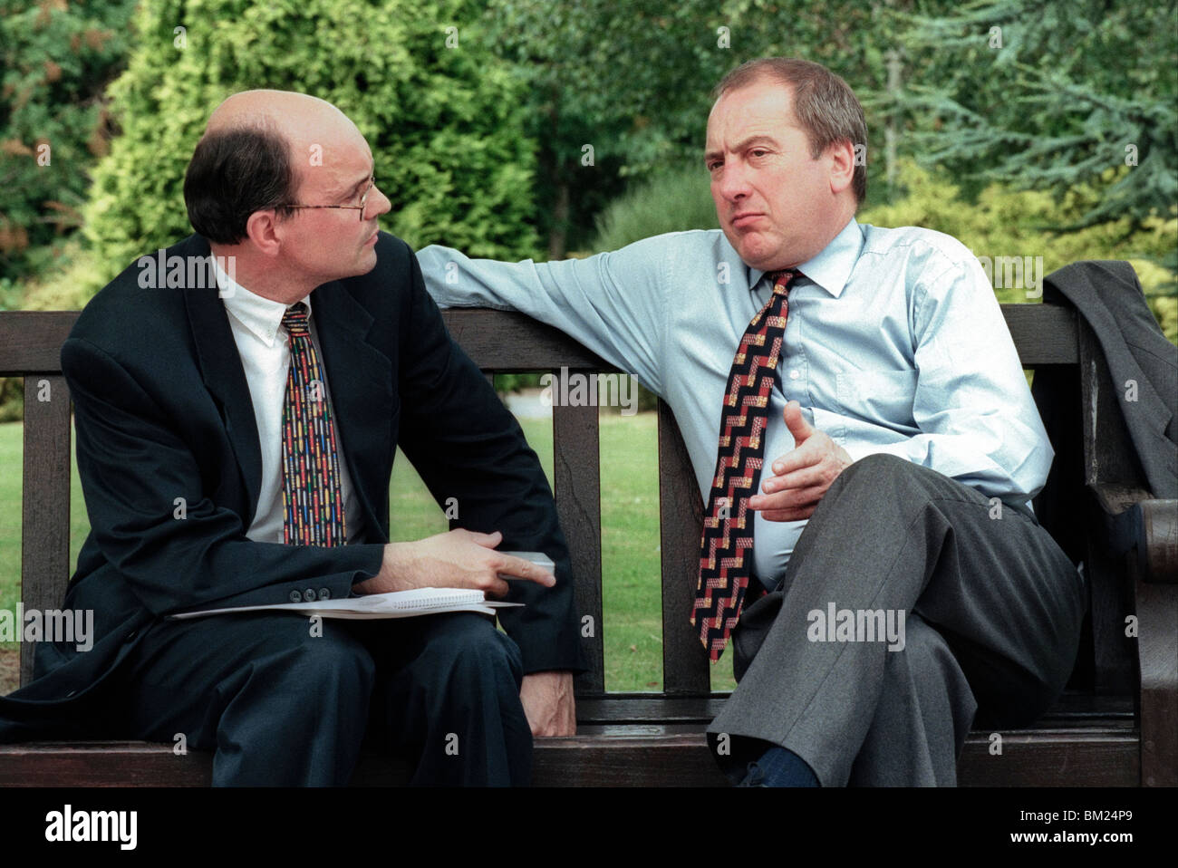 Secretary of State for Wales Ron Davies (right) speaking to journalist ...