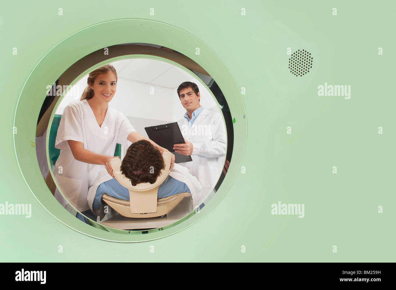 Doctor and nurse preparing a patient for MRI scan Stock Photo - Alamy