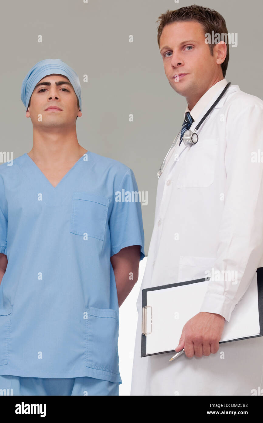Two doctors standing together Stock Photo - Alamy