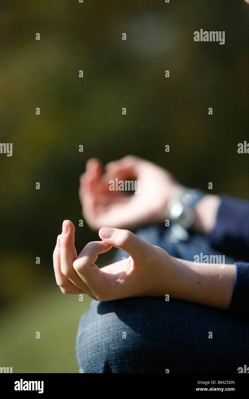 Close-up of hands during meditation Stock Photo - Alamy