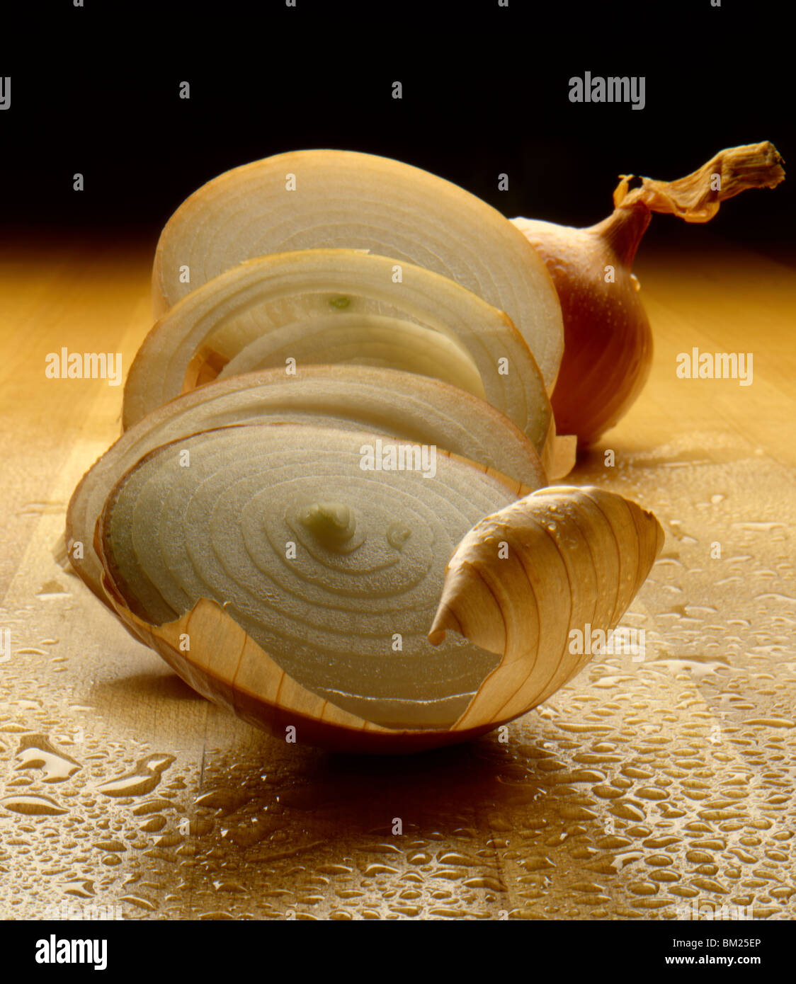 Close-up of sliced onion on butcher block Stock Photo - Alamy