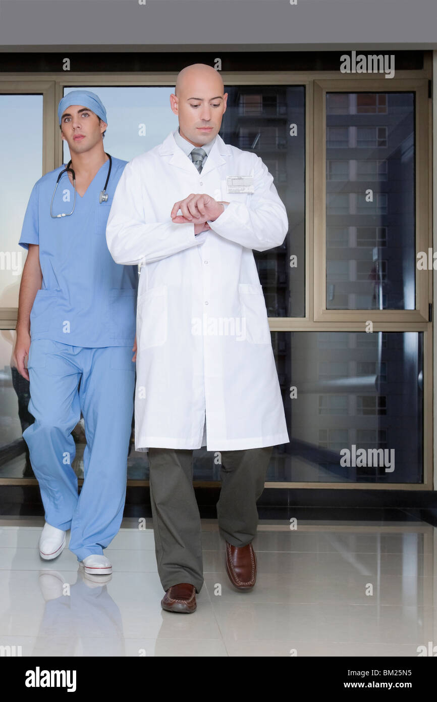 Doctor walking hospital hi-res stock photography and images - Alamy