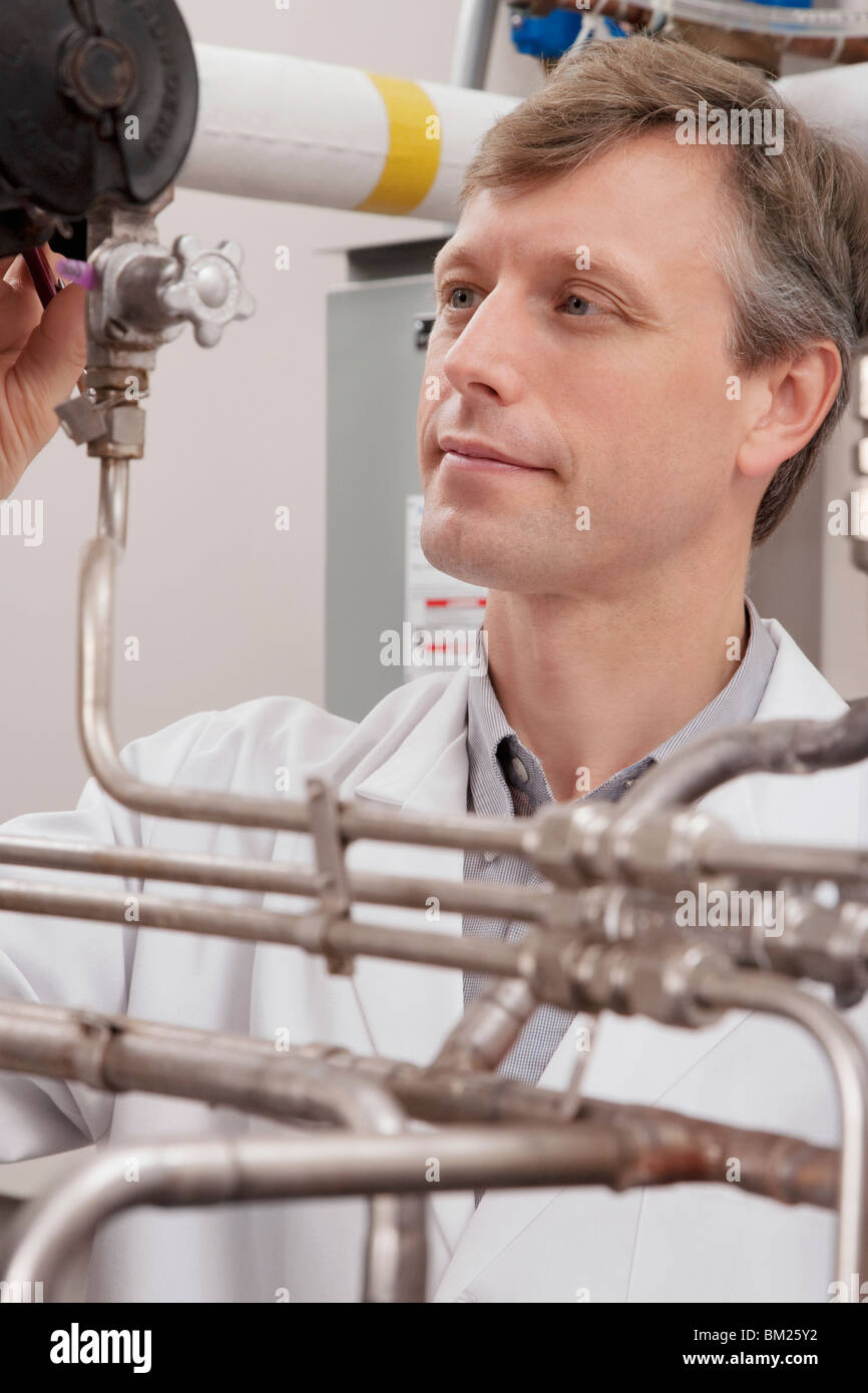 Doctor researching in a laboratory Stock Photo - Alamy